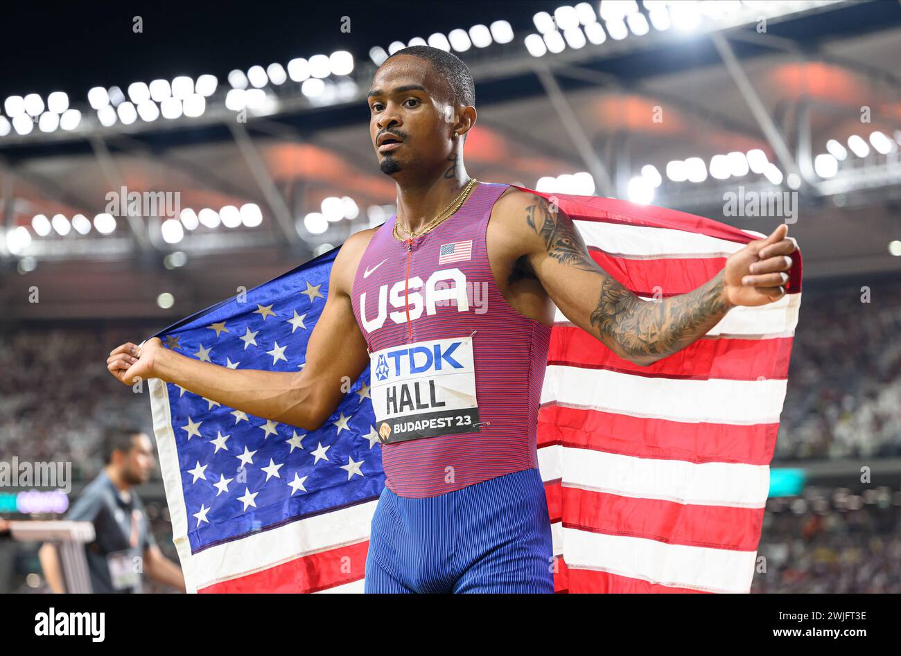Quincy HALL celebrating his medal with the flag in the Budapest 2023 ...