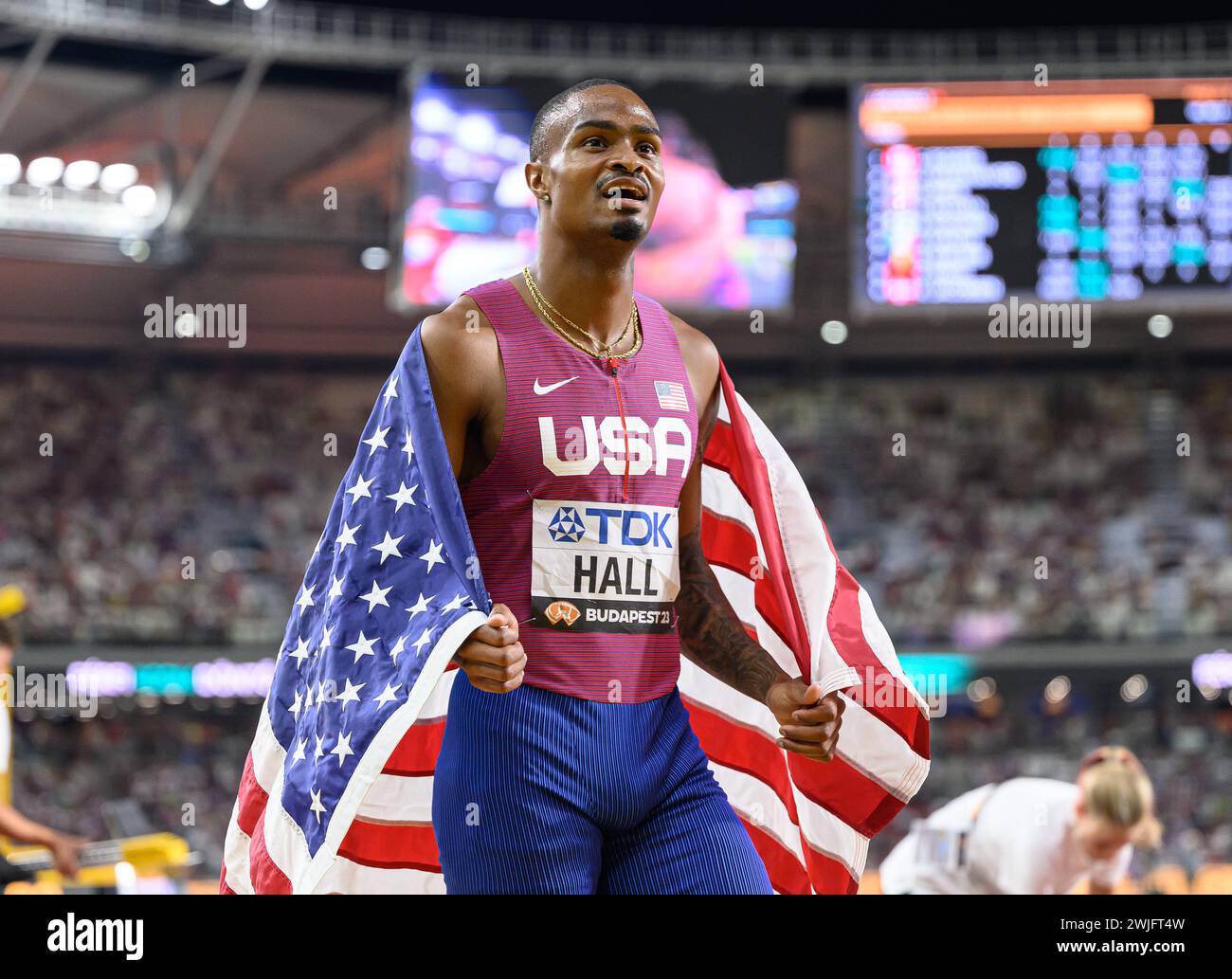 Quincy HALL celebrating his medal with the flag in the Budapest 2023 ...