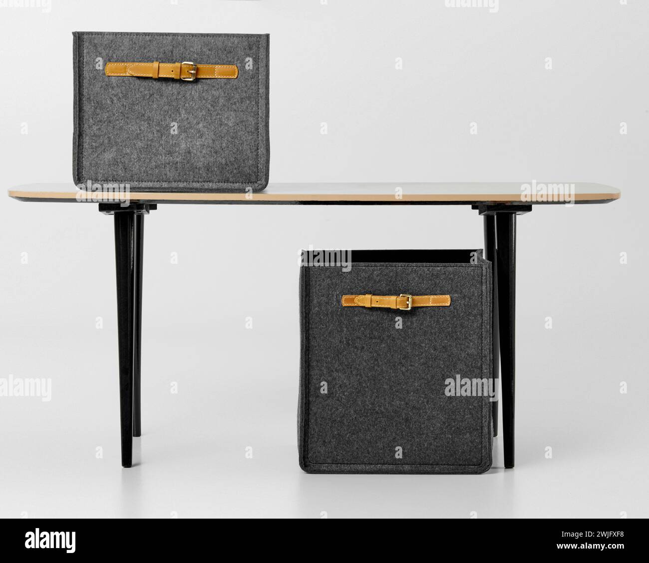 Contemporary office setup featuring modern grey felt storage boxes with ...