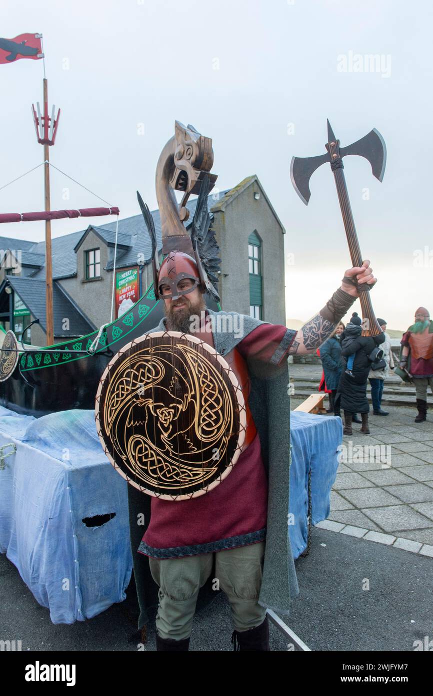 2024 Guizer Jarl John Robert leads his squad through Shetland town ...