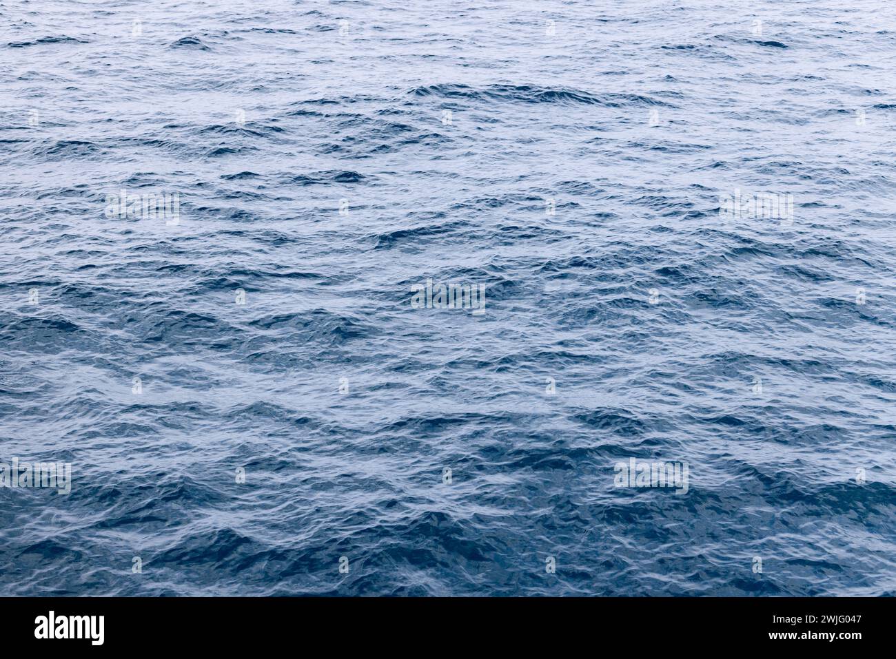 The calming ripples of the North Atlantic Ocean near Norway, presenting ...