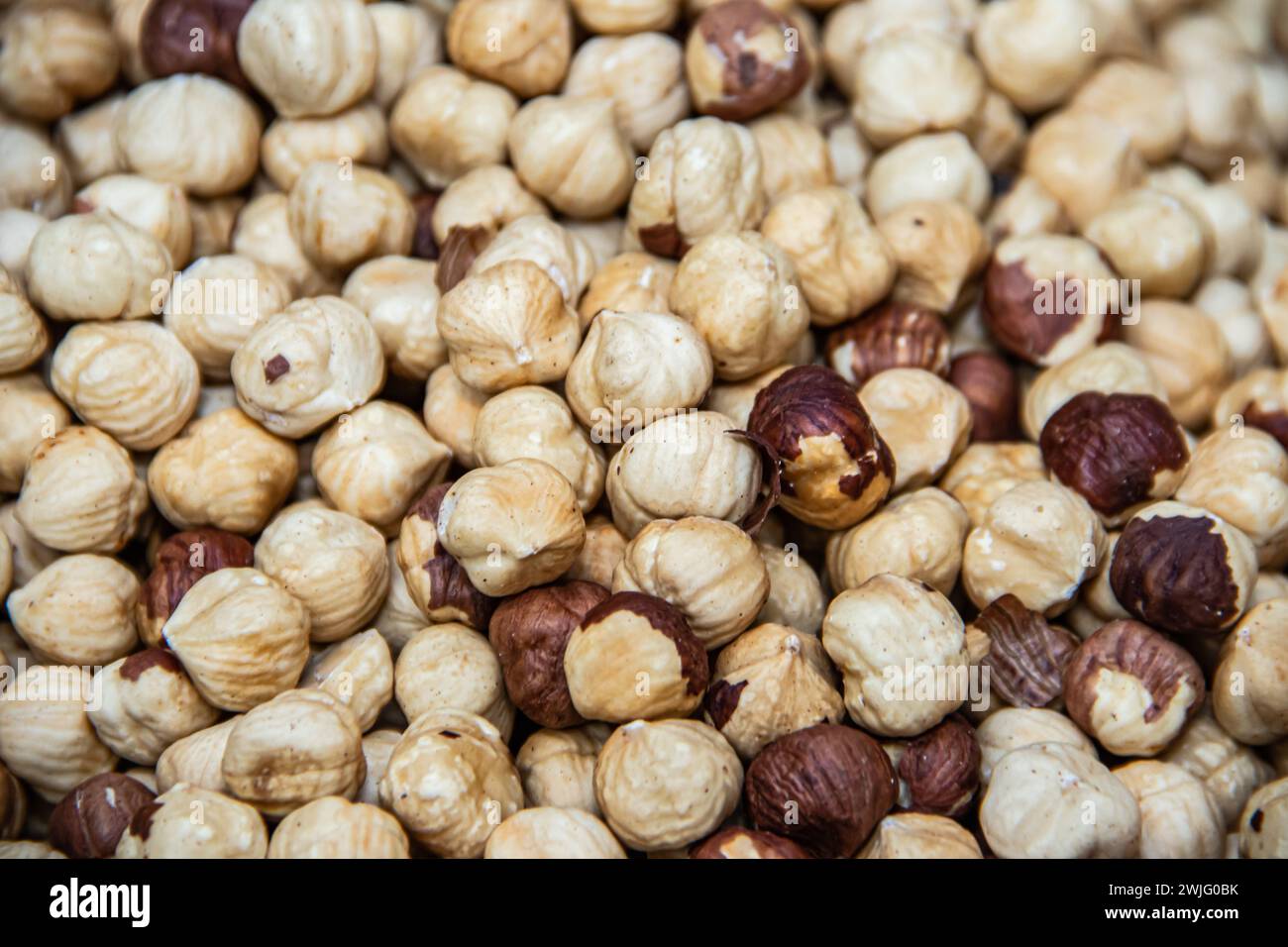 Dried and roasted hazelnuts close up in street market healthy food shop ...