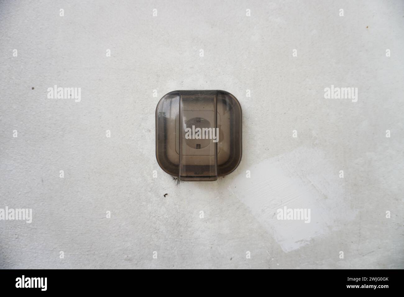 Protective power plugs on the wall for user safety Stock Photo - Alamy