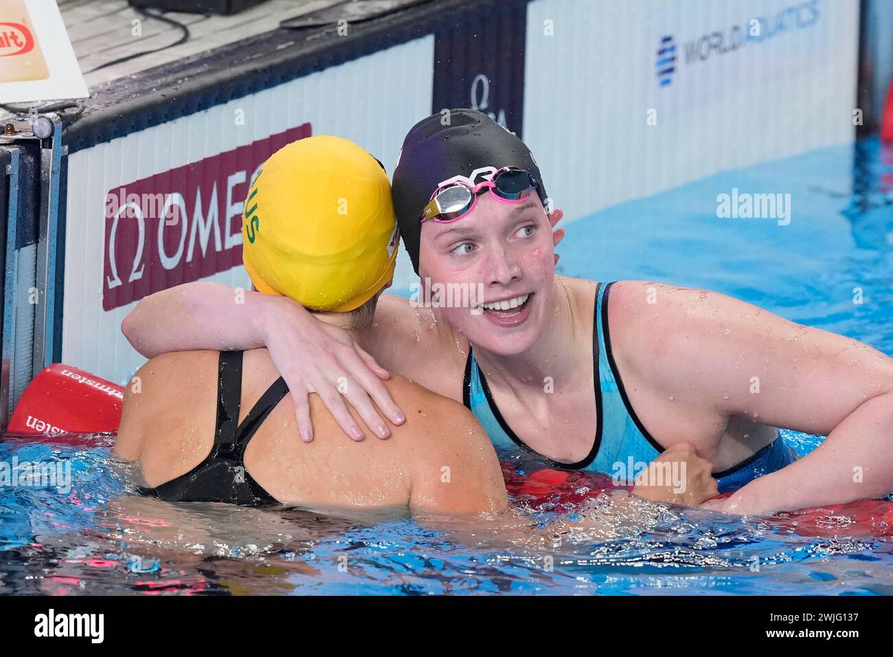 Claire Curzan of the United States, right, and Iona Anderson of ...