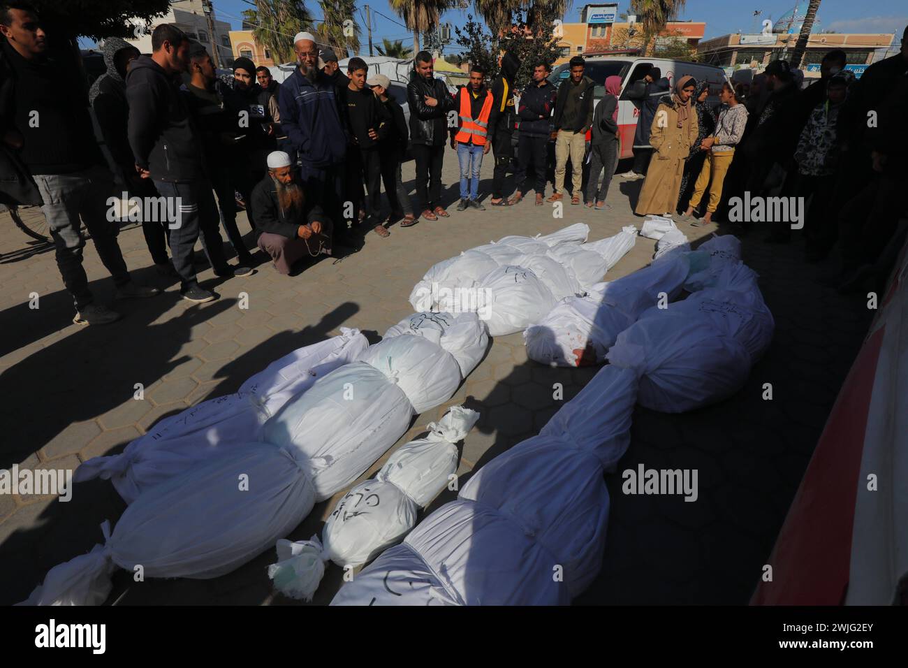 Relatives of the Palestinians died in Israeli attacks, mourn as they ...