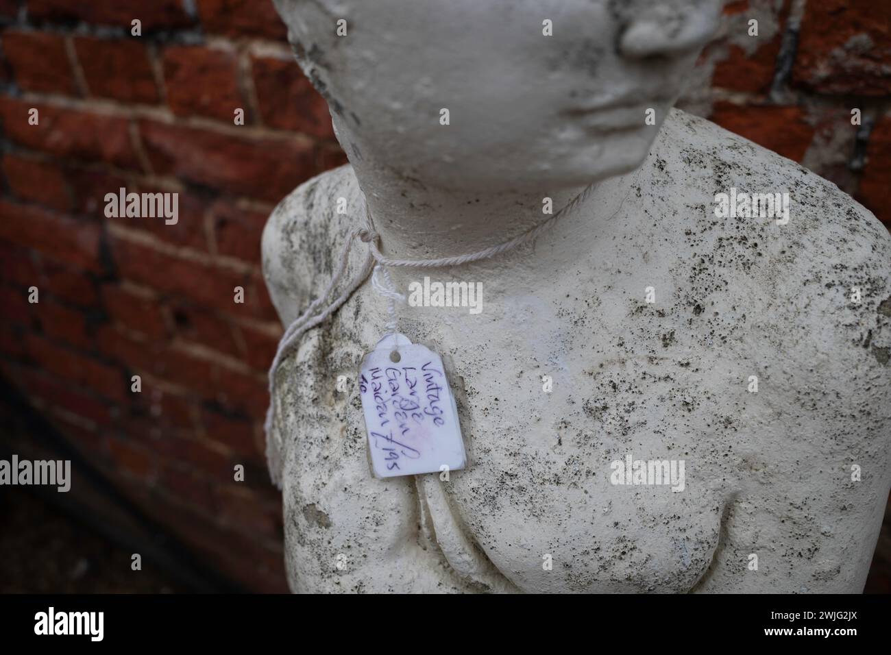 Vintage garden maiden sculpture for sale Stock Photo - Alamy