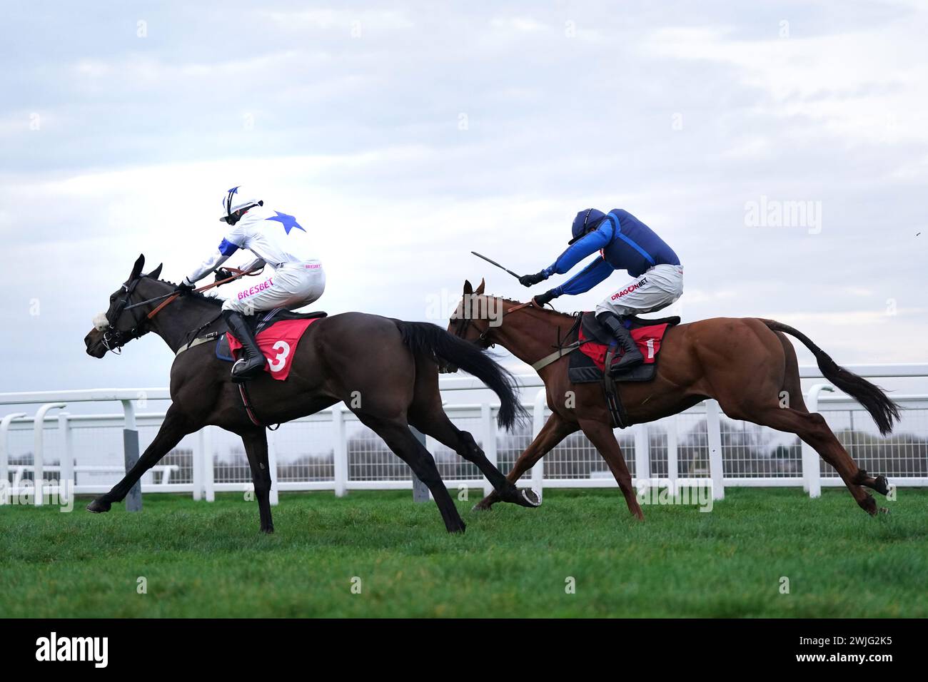 Titan Discovery ridden by jockey Liam Harrison (left) on their way to ...