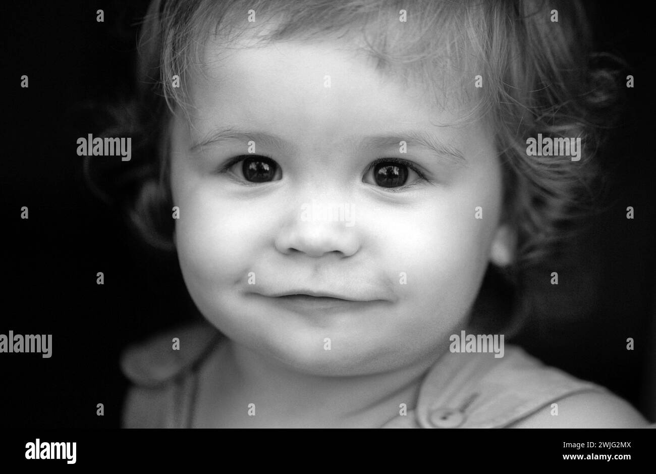 Funny baby face close up. Kids head portrait Stock Photo - Alamy