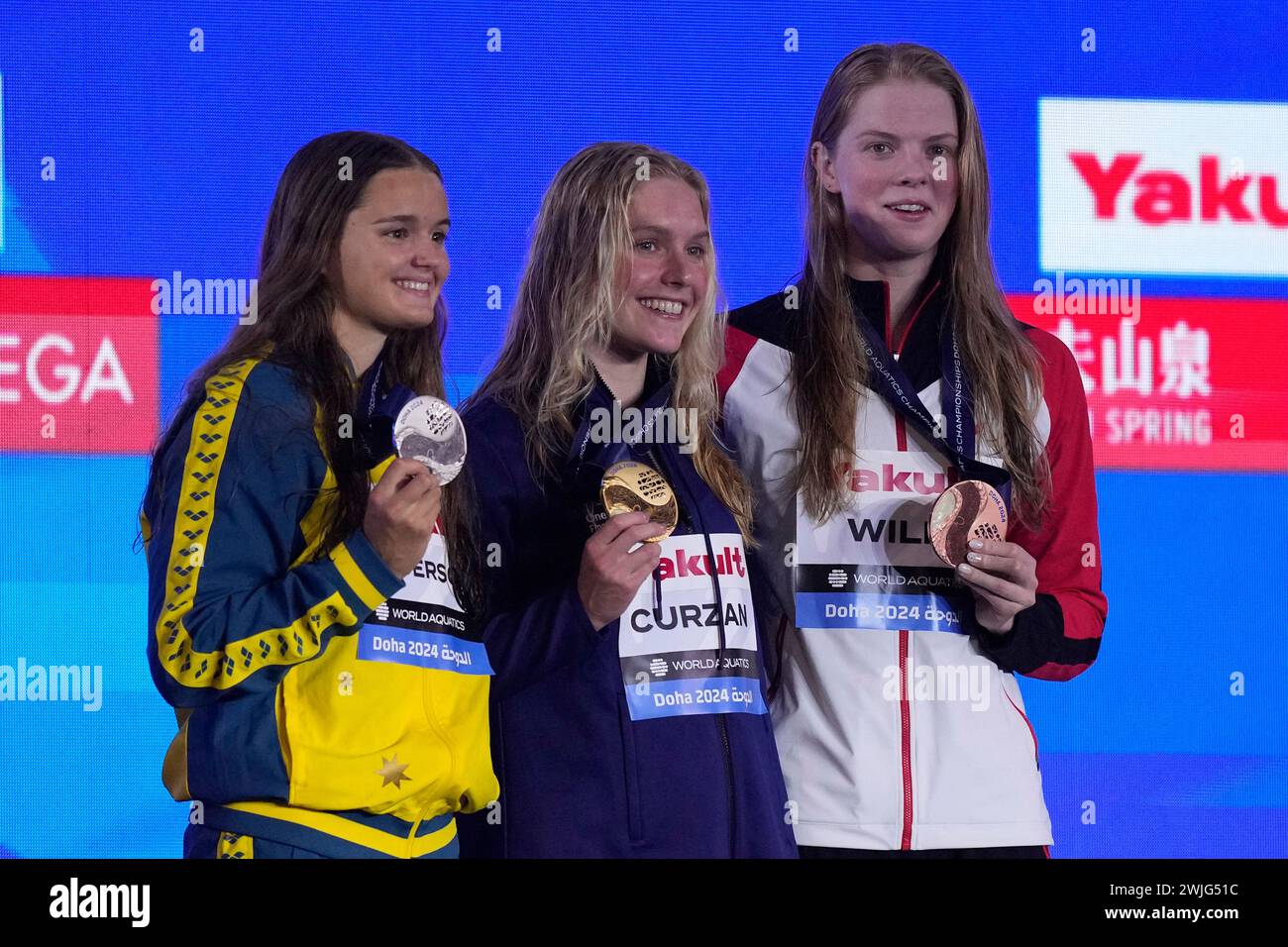 Gold medalist Claire Curzan of the United States, center, silver ...