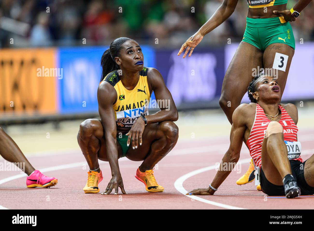 Rushell CLAYTON celebrating his medal with the flag in the Budapest ...