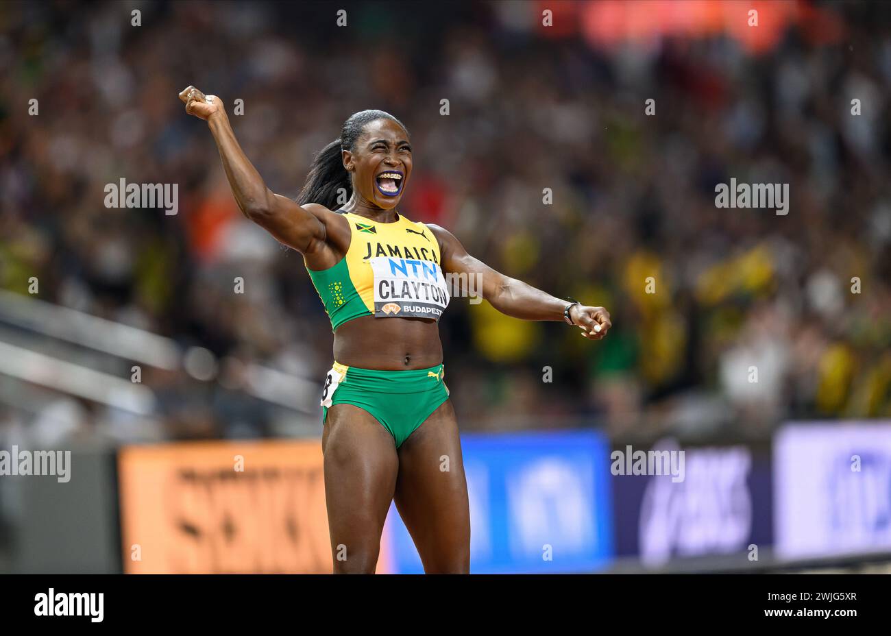 Rushell CLAYTON celebrating his medal with the flag in the Budapest ...