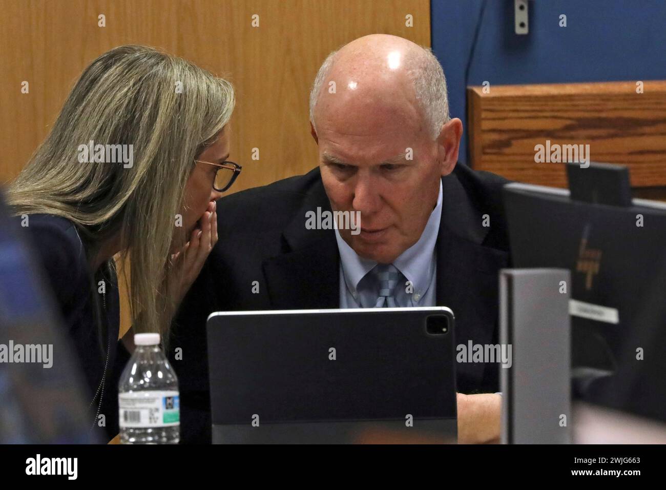 Attorney Jennifer Little, left, speaks with attorney Steve Sadow ...