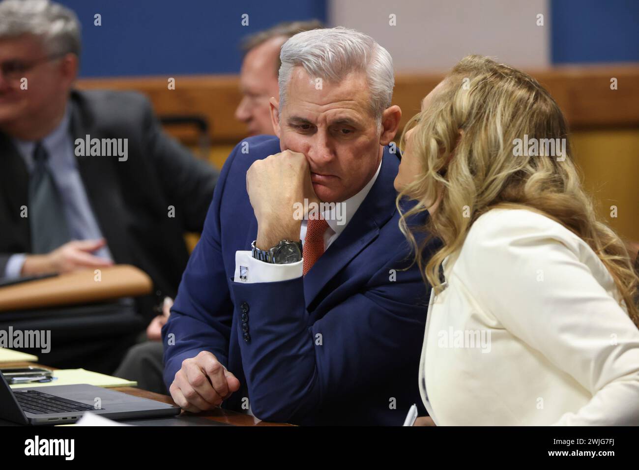 Ashleigh Merchant, attorney for Michael Roman, speaks with her husband ...