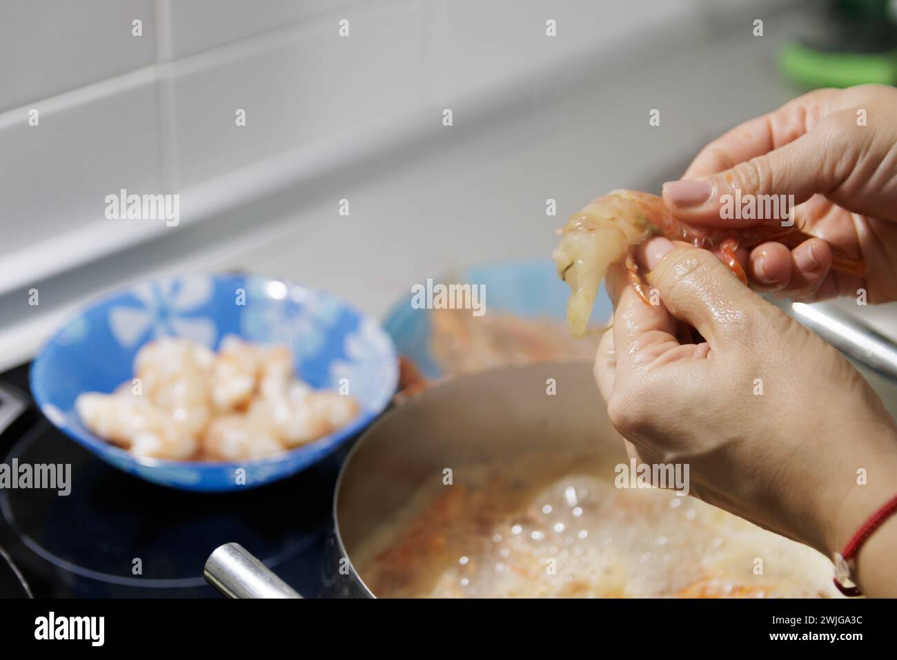 Fish in sauce with shrimp. Step by step preparation. peeling shrimp ...