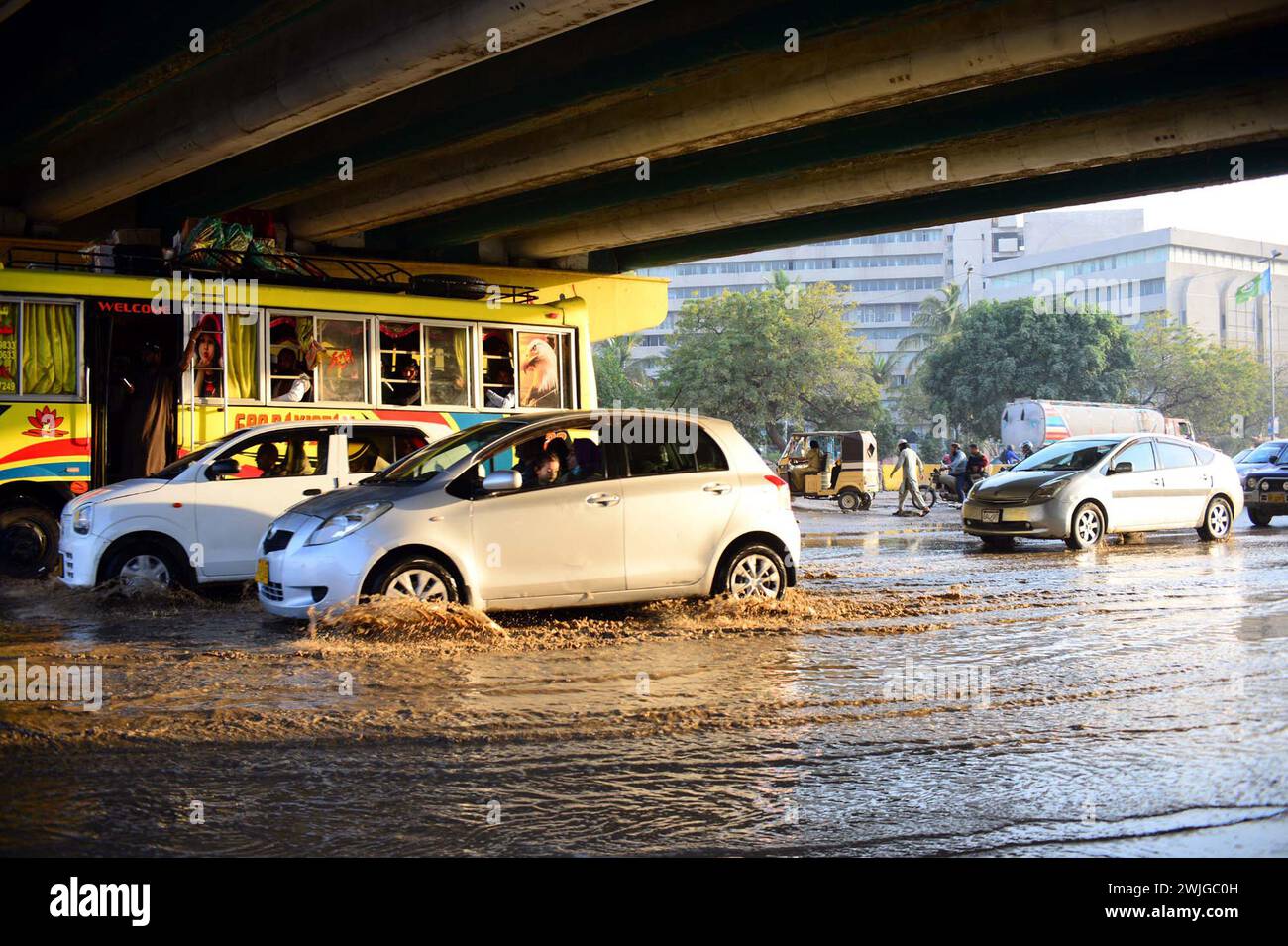 Inundated road by overflowing drinking water, creating problems for ...