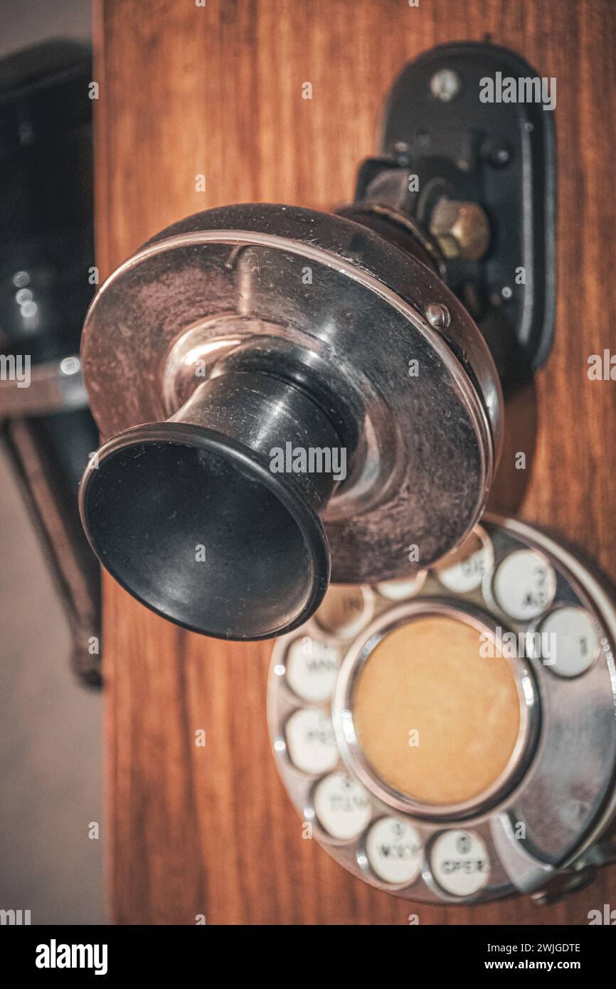 Vintage telephone hanging on the wall hi-res stock photography and ...