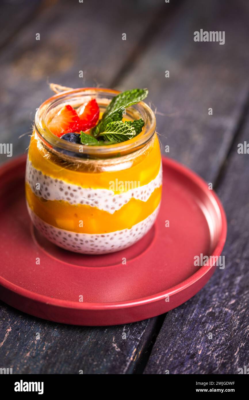 Chia seed pudding with mango, mixed berries, milk, Greek yogurt ...