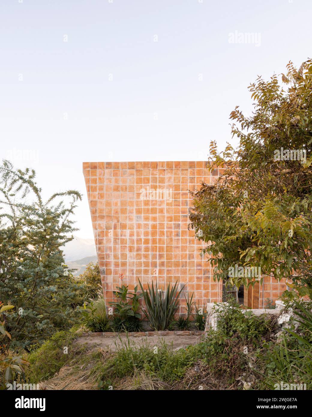 Side elevation displaying tile cladding. Casa Perucho, Perucho, Ecuador ...
