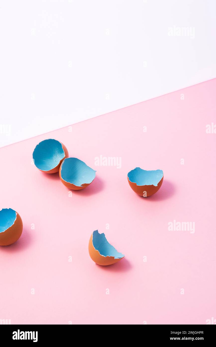 Blue painted easter eggs shells on pink, and white background Stock ...