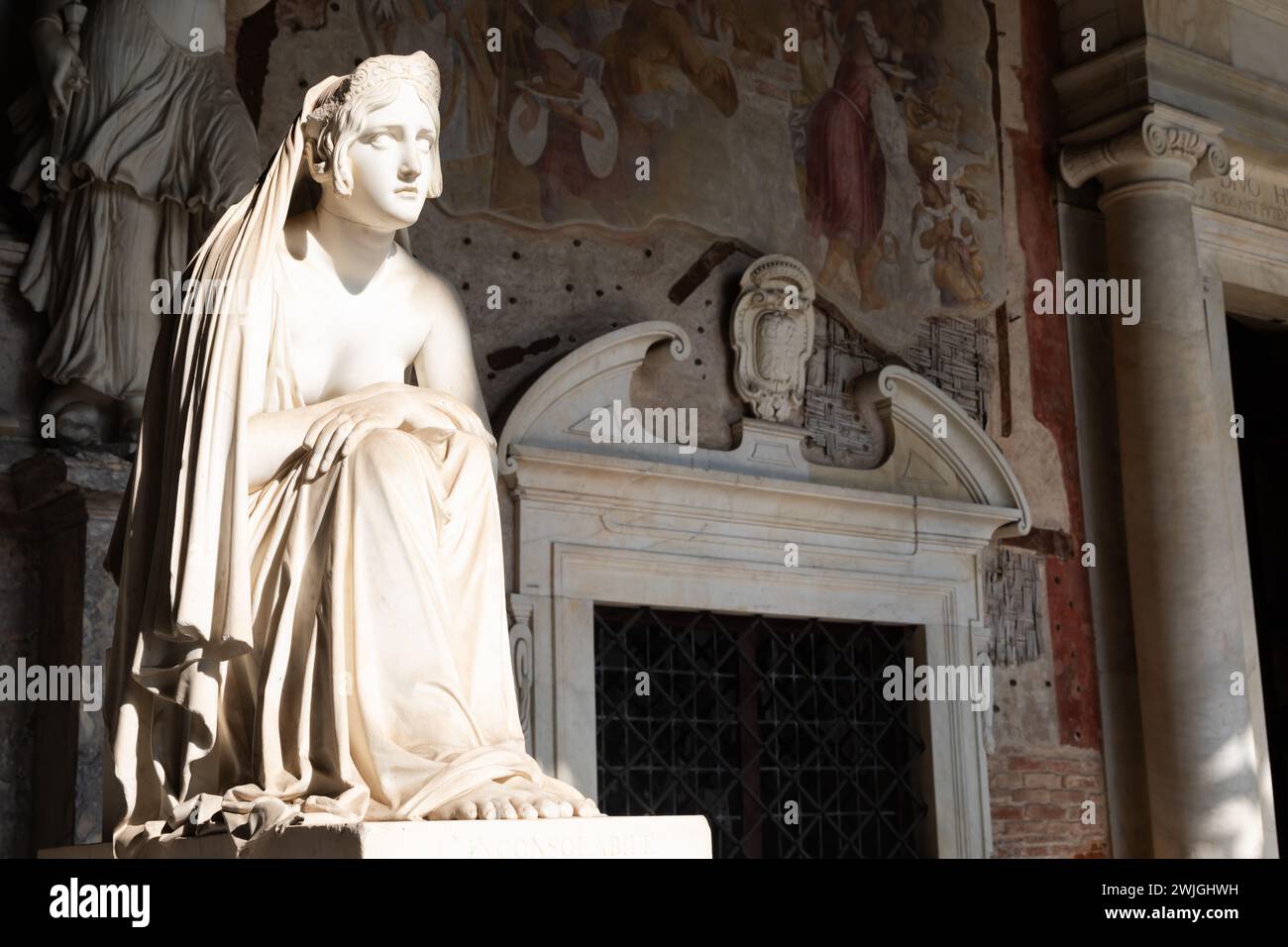 Pisa, Italy - June 2023: catholic cemetery, antique statue of sad woman ...