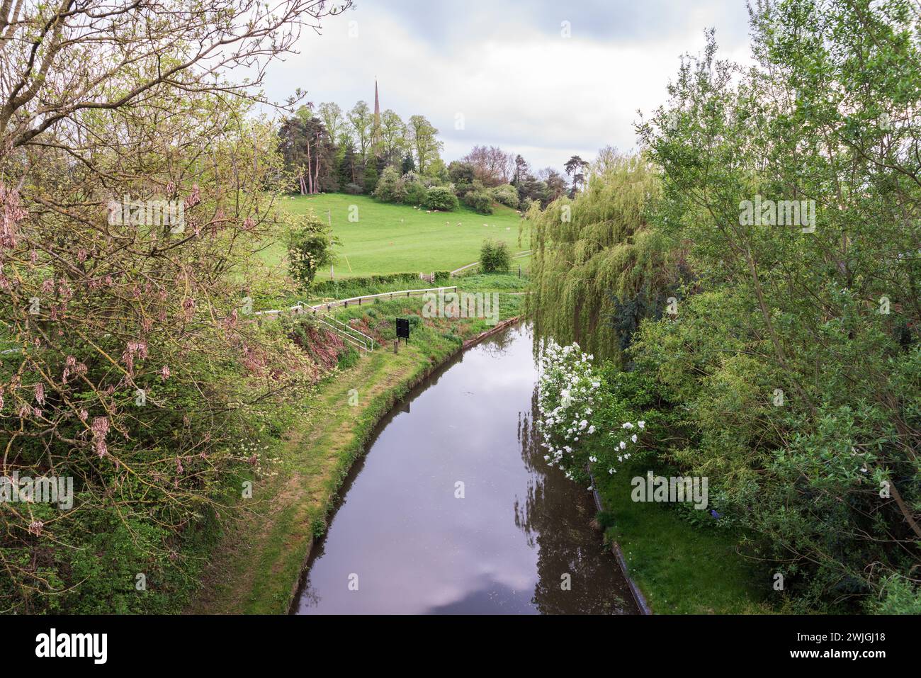 Tardebigge canal of an evening with trees, water and clouds Stock Photo ...