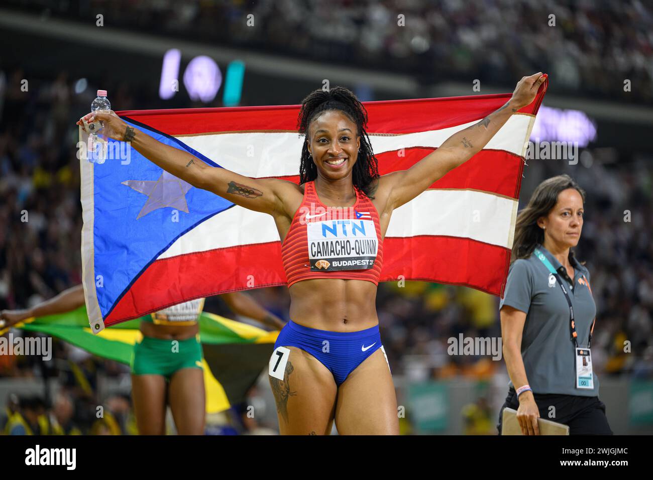 Jasmine CAMACHO-QUINN celebrating his medal with the flag in the ...