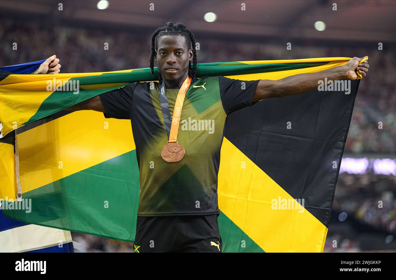 Tajay GAYLE celebrating his medal with the flag in the Budapest 2023 ...