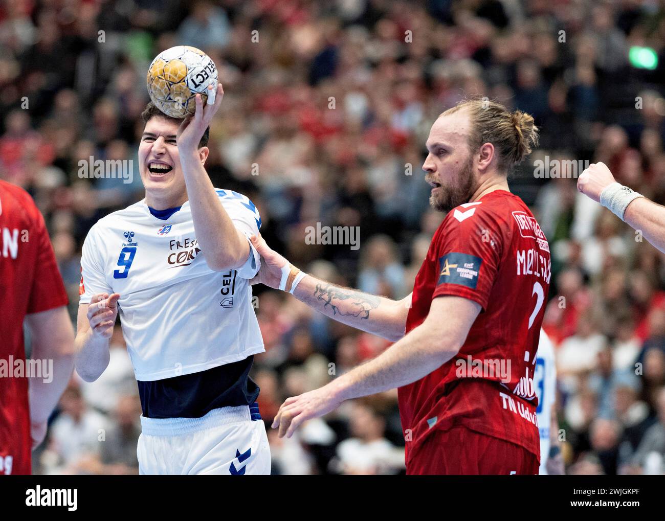 HC Zagreb's Luka Lovre Klarica and Aalborg Haandbold's Henrik Moellgaard in the EHF Champions ...