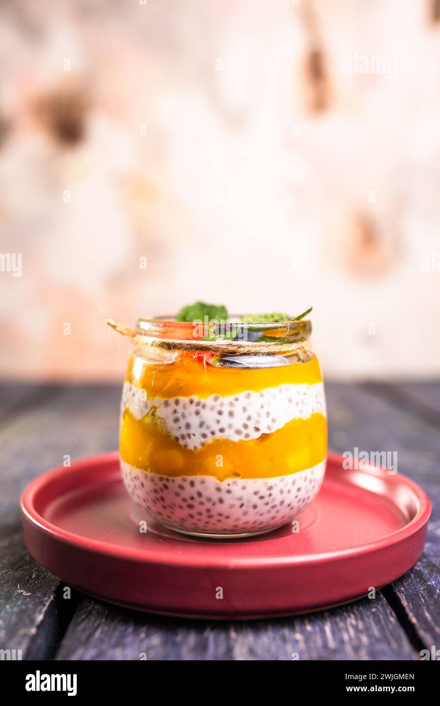 Chia seed pudding with mango, mixed berries, milk, Greek yogurt ...