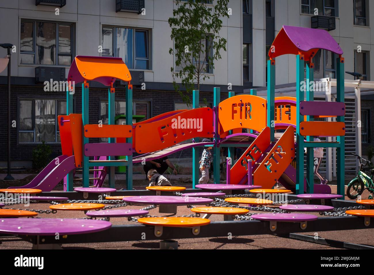 A vibrant playground with colorful equipment for kids, creating a fun ...