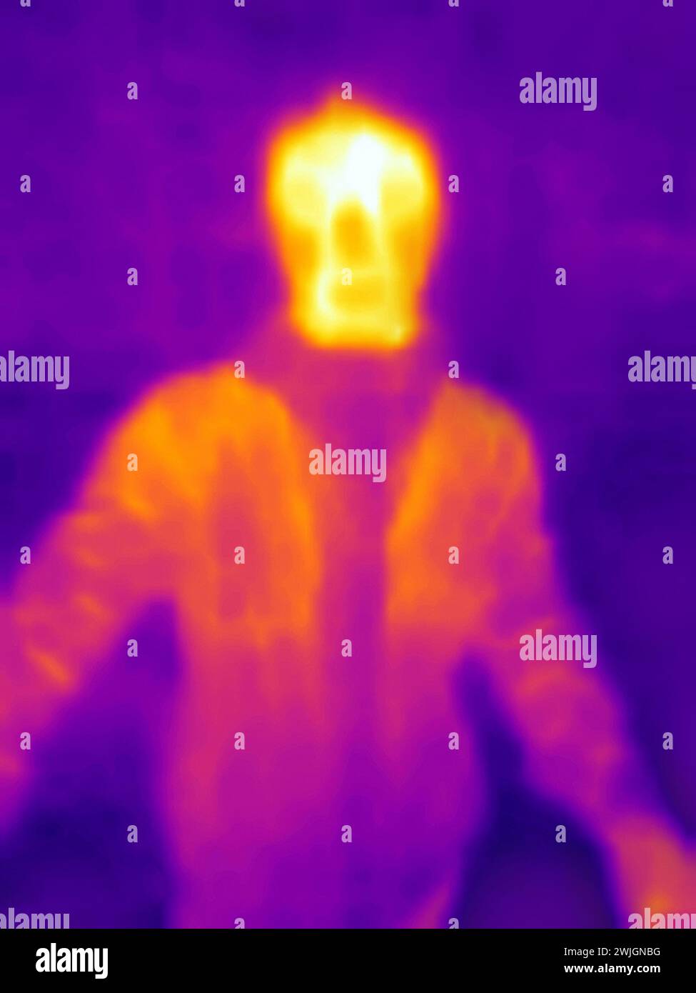 The image from the thermal imager device. Human heat map. Blurred ...
