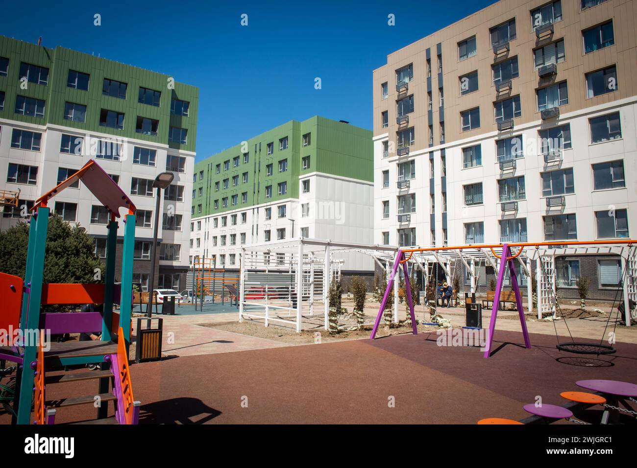 A vibrant playground with colorful equipment for kids, creating a fun ...