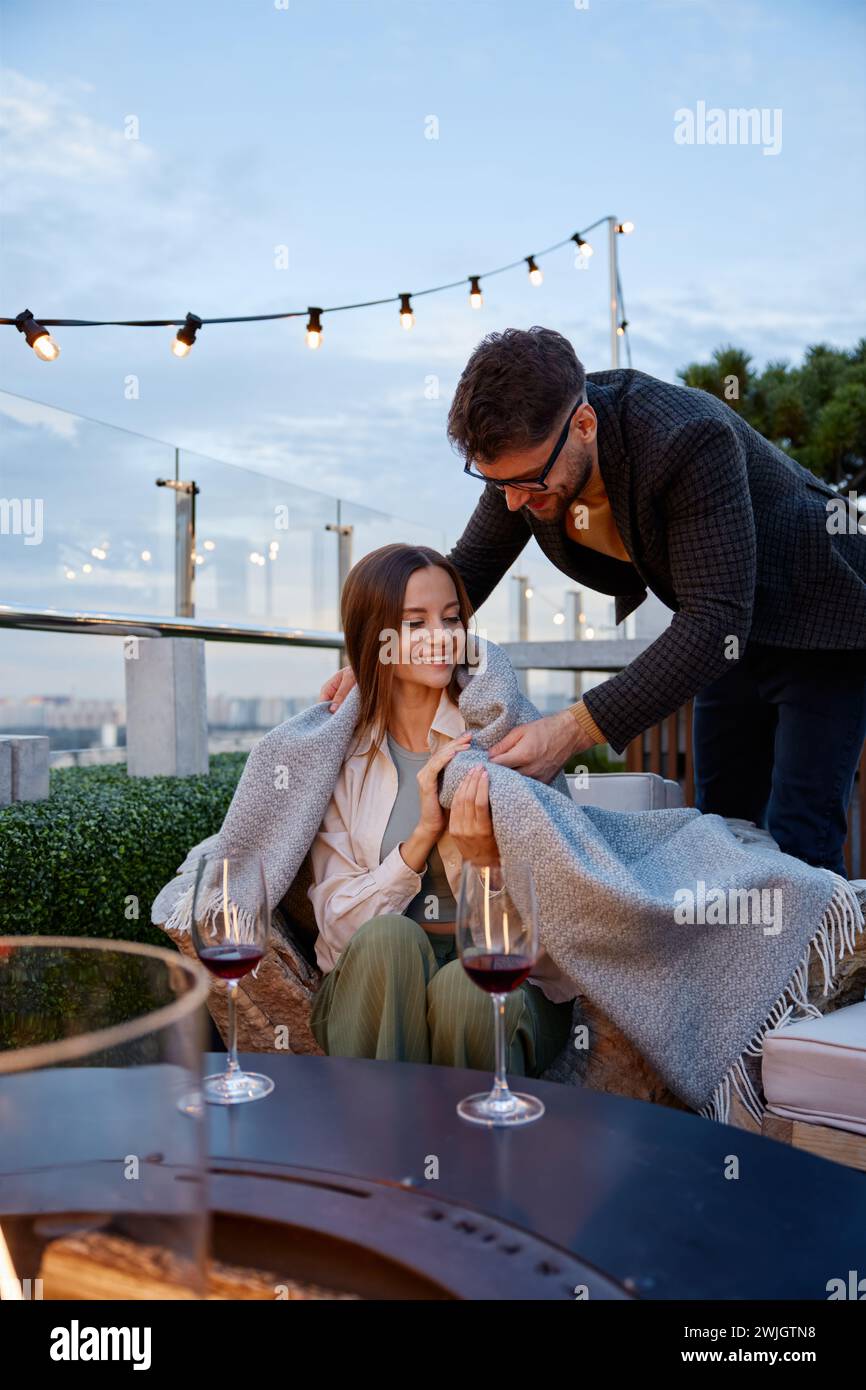 Attentive boyfriend caring girlfriend, idyllic atmosphere during ...