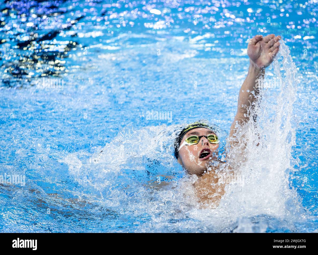 DOHA - Kai van Westering in action during the men's 200 back semi-final ...