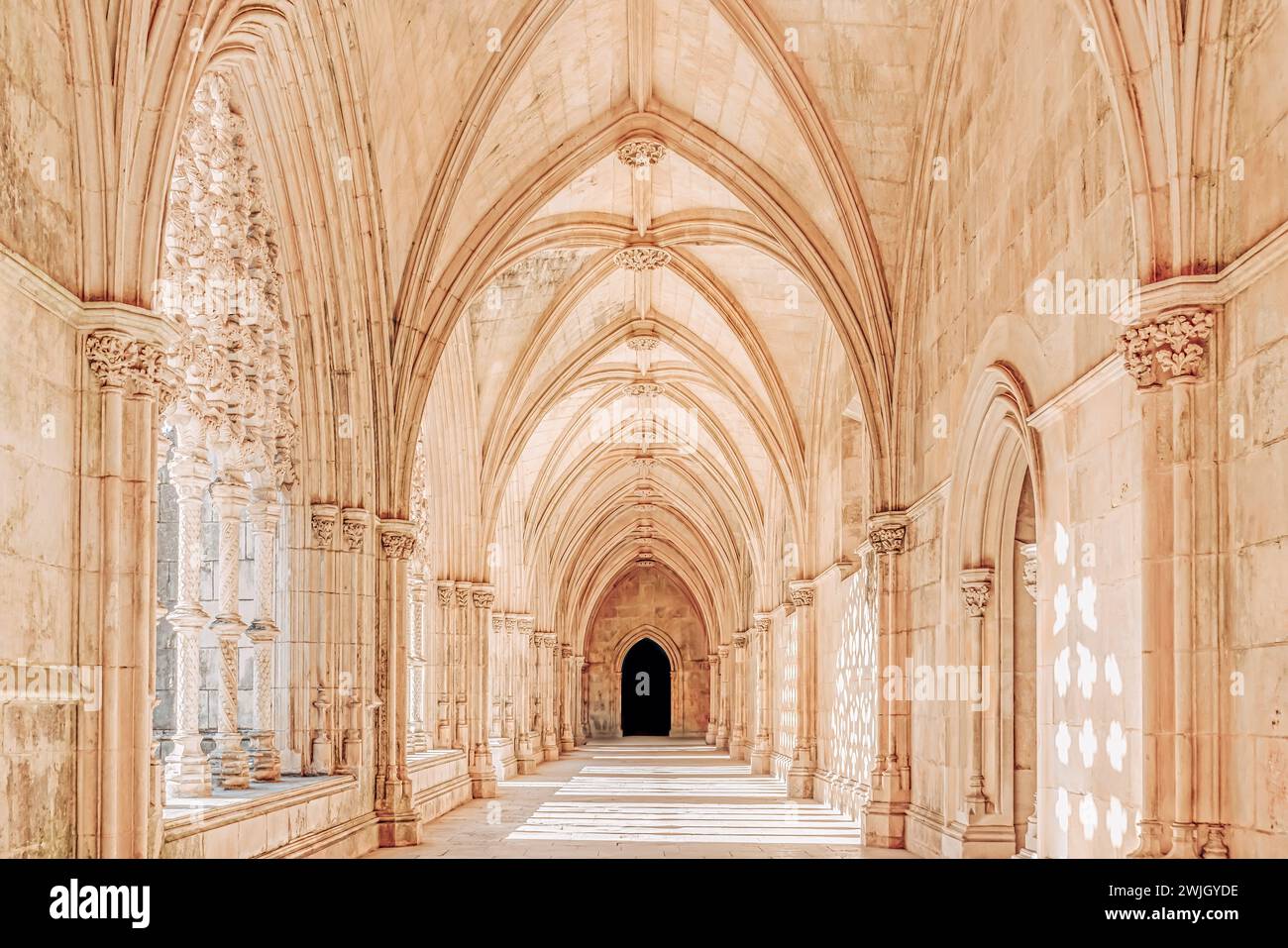 Gallery of the medieval cloister in Gothic and Manueline style of the ...