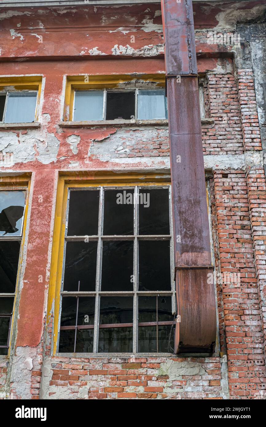 old decaying building with broken windows Stock Photo - Alamy