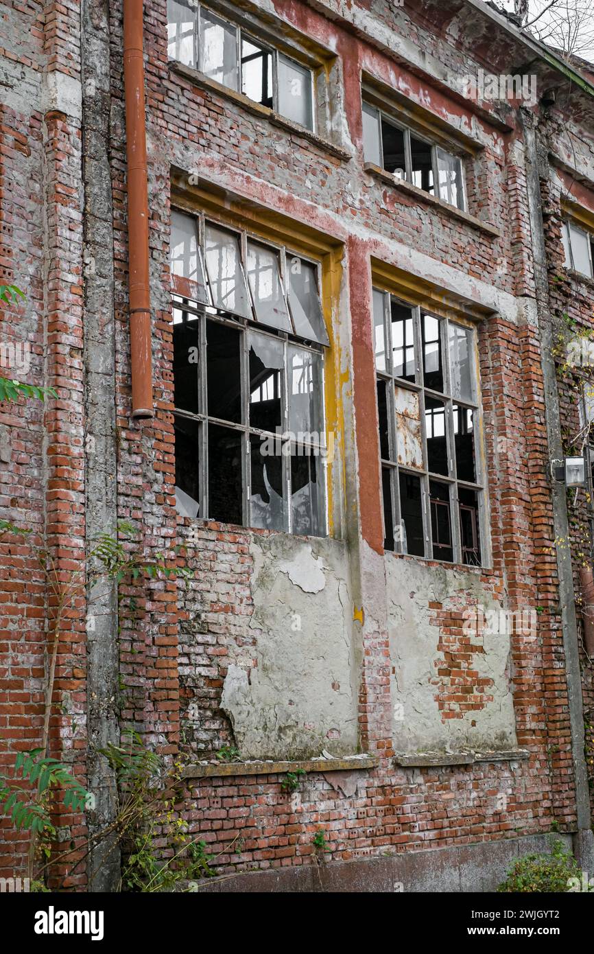 old decaying building with broken windows Stock Photo - Alamy