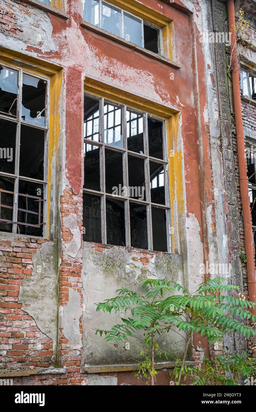 old decaying building with broken windows Stock Photo - Alamy