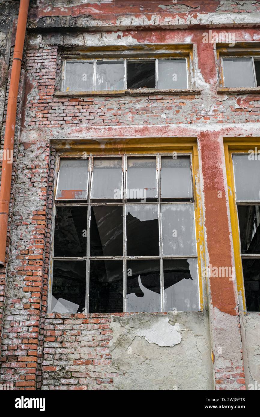 old decaying building with broken windows Stock Photo - Alamy