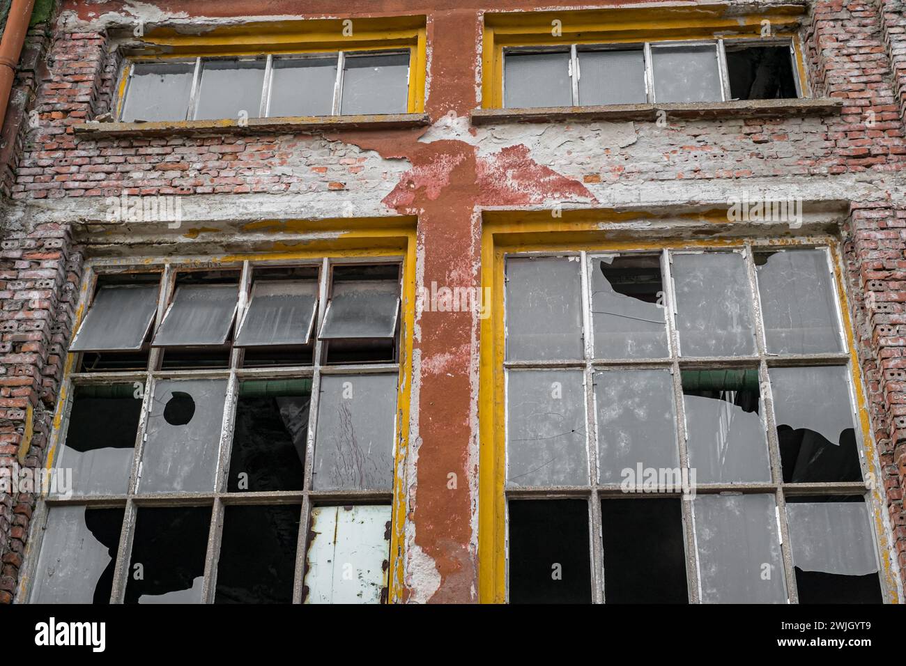 old decaying building with broken windows Stock Photo - Alamy