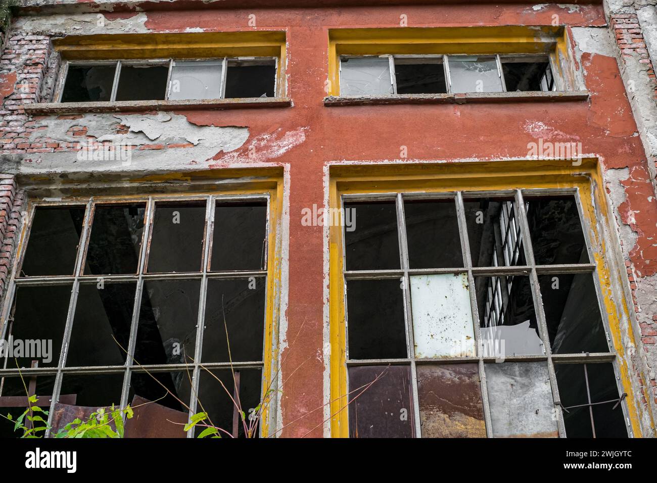old decaying building with broken windows Stock Photo - Alamy