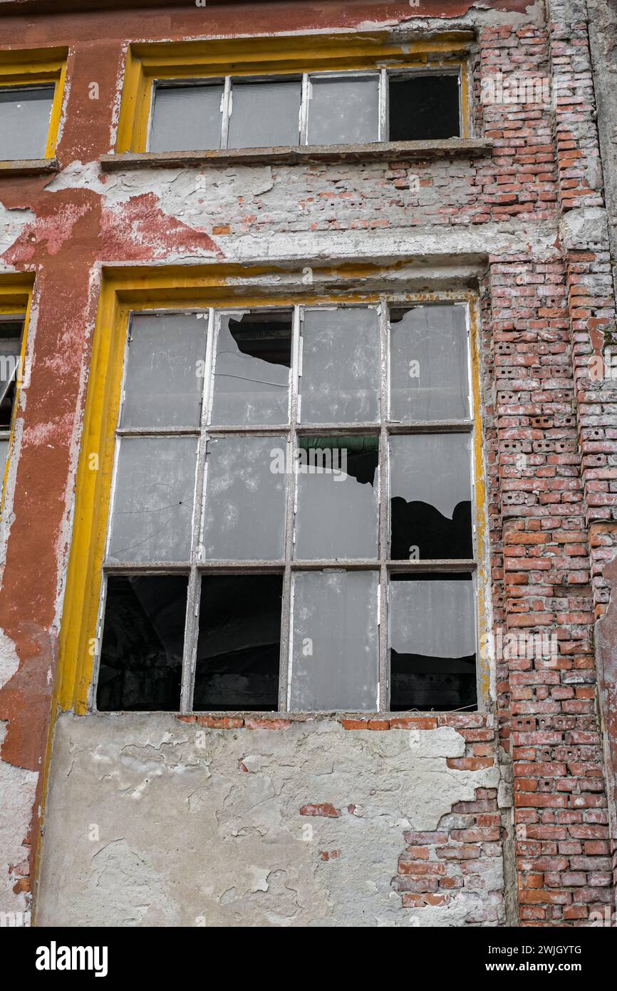 old decaying building with broken windows Stock Photo - Alamy