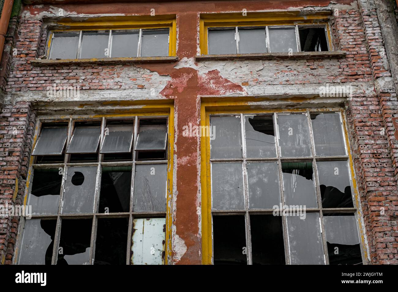 old decaying building with broken windows Stock Photo - Alamy