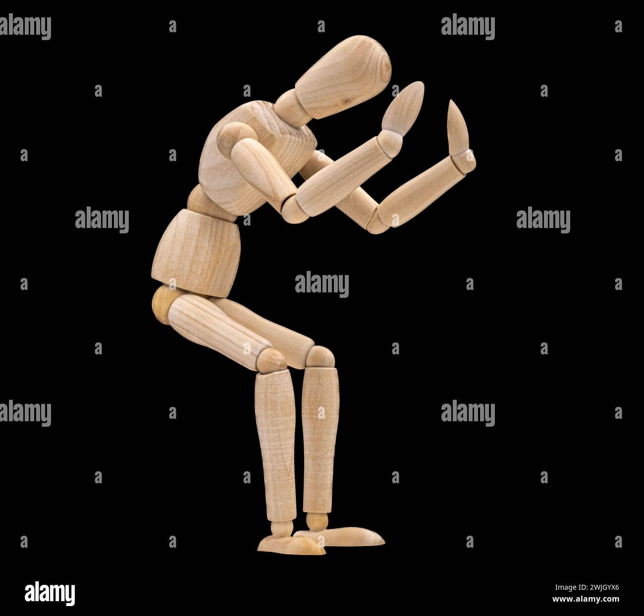 wooden mannequin in thinking pose on black background Stock Photo - Alamy