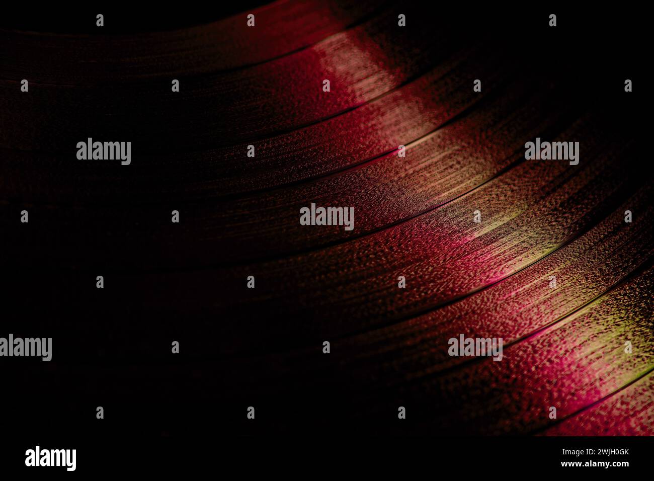 red Vinyl record rotating in a macro shot Stock Photo - Alamy