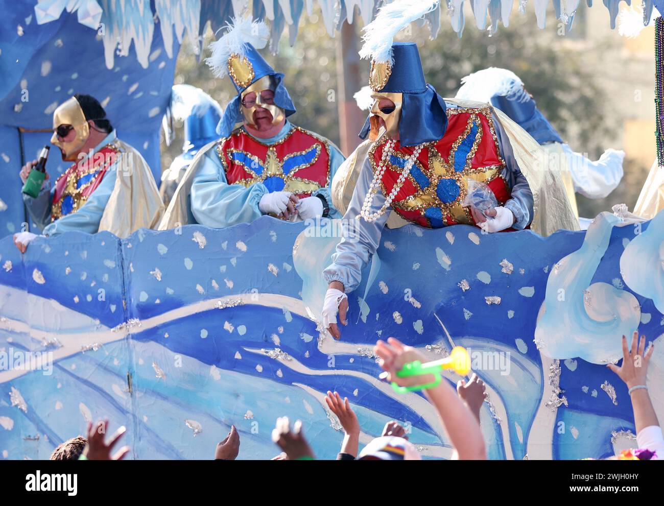New Orleans, USA. 13th Feb, 2024. Members of the Yuki-onna float throw ...