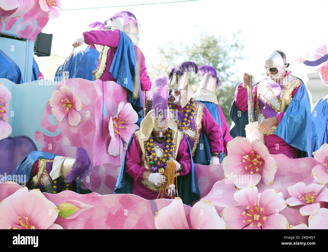 New Orleans, USA. 13th Feb, 2024. Members of the Jiu-Roku-Zakura float ...