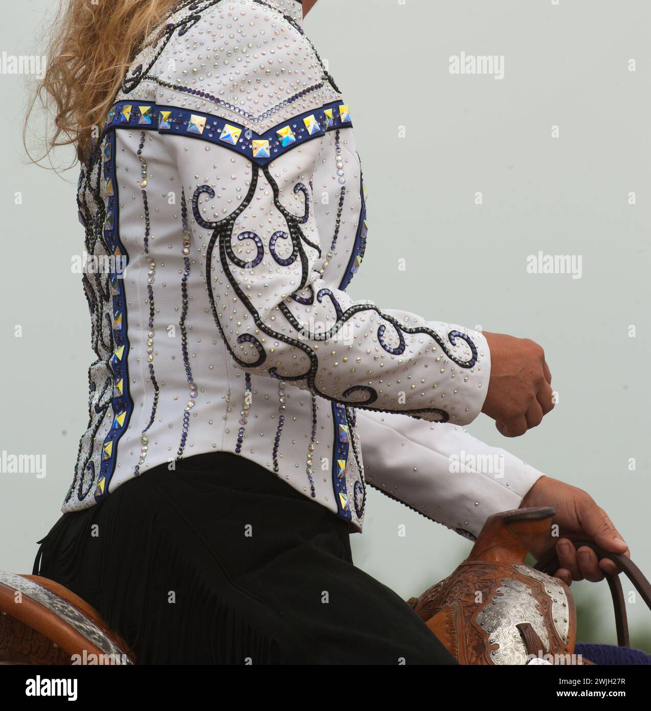 western horse show attire female horse rider wearing bright shirt with ...