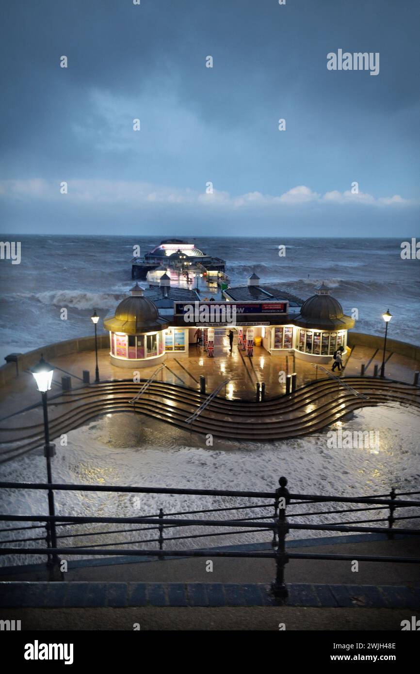 cromer pier cromer norfolk UK in high winds and bad weather Stock Photo ...