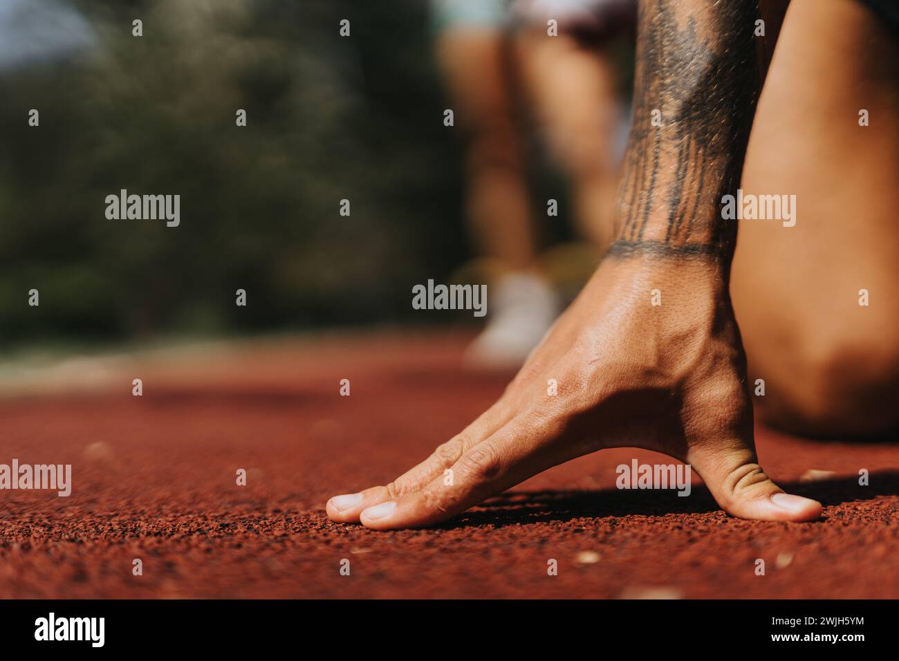Male runners starting position hi-res stock photography and images - Alamy